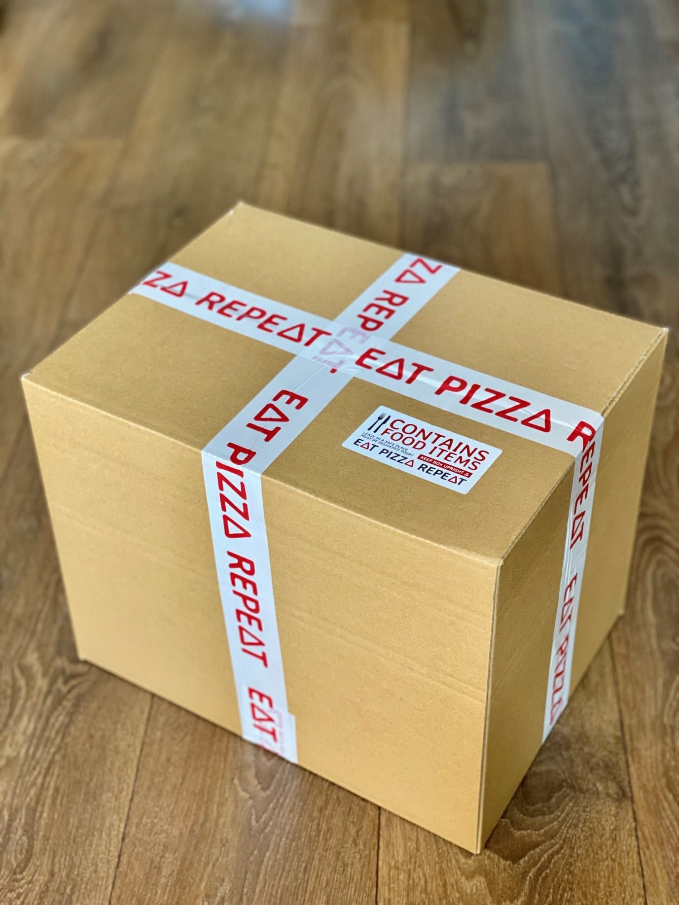 Pizza Specialists get the “WOW” factor | Printed Tape | Le Mark Group